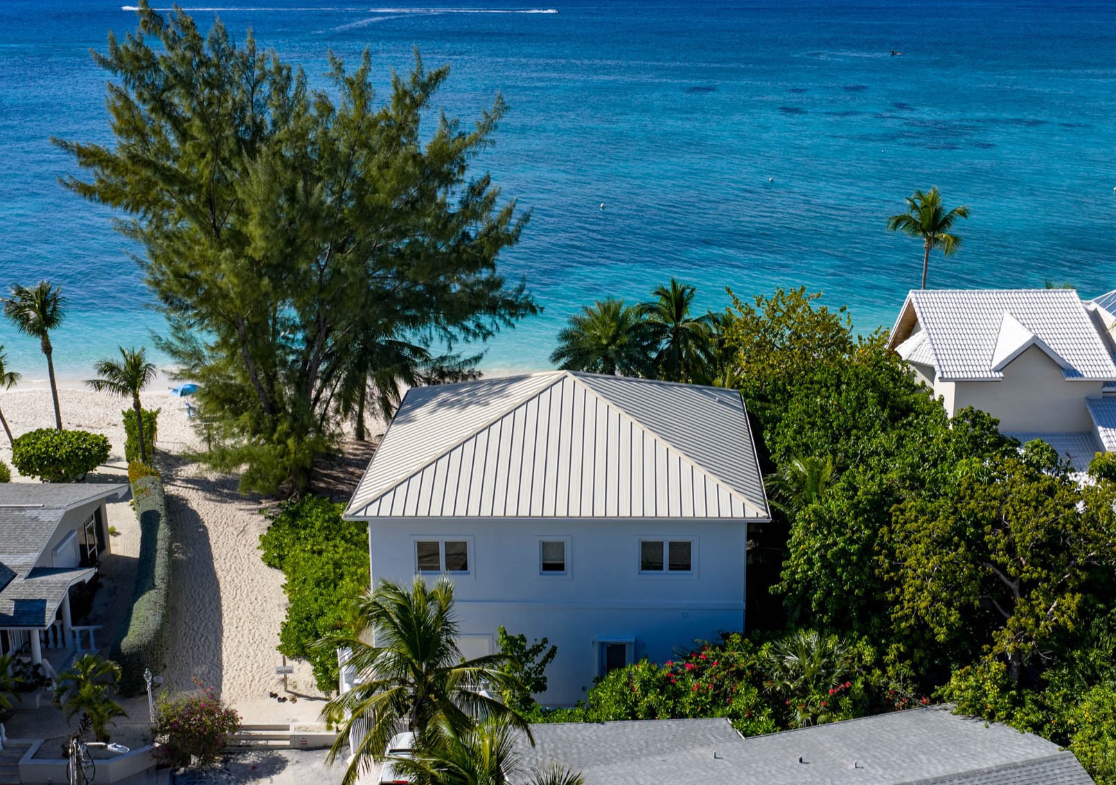 LIZARD RUN #42 - SEVEN MILE BEACHFRONT HOME | Provenance Properties